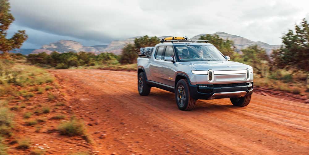 Happier Camper Gives the Rivian Electric Pickup a Towing Test - RV.com